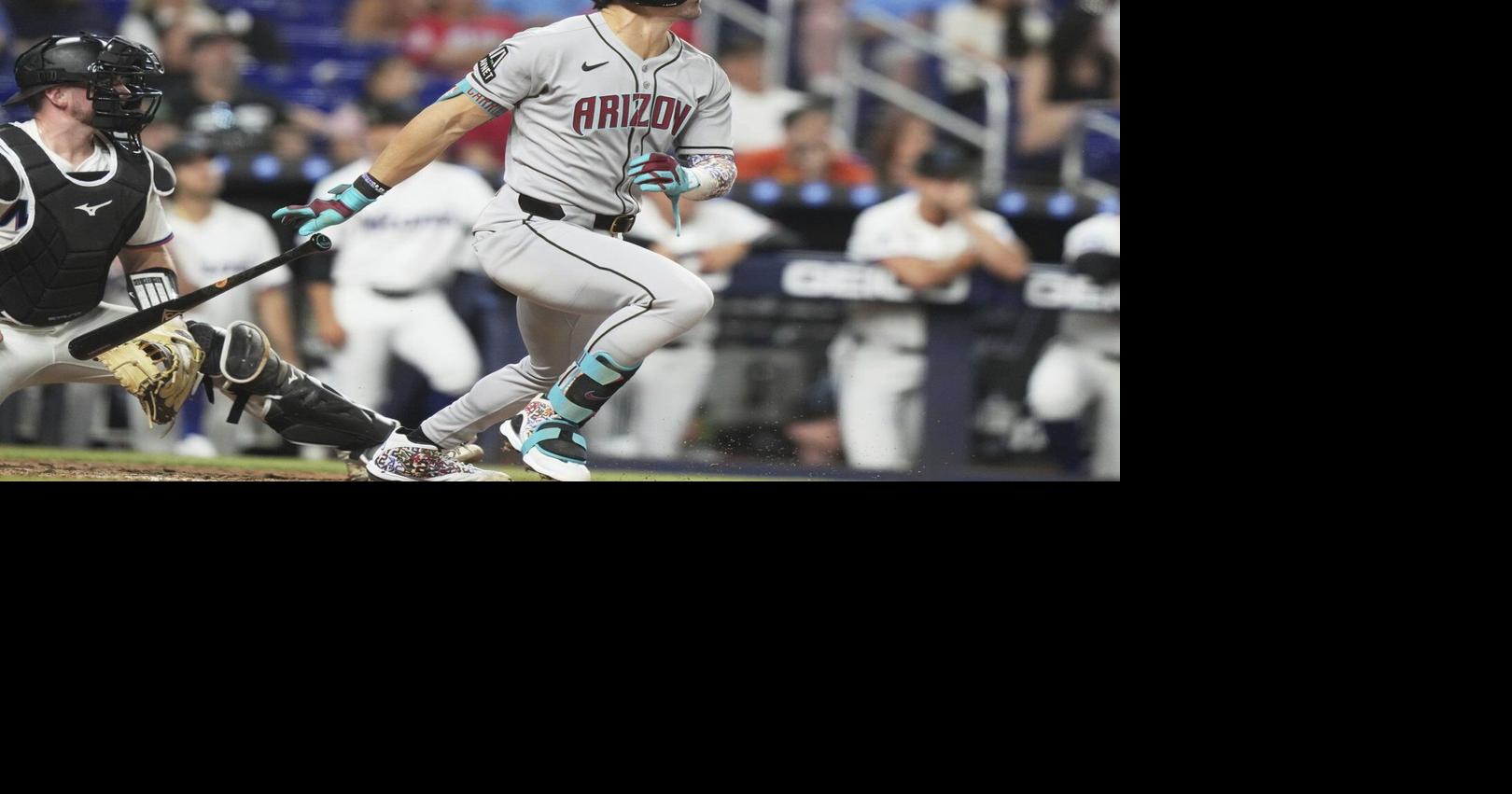Carroll hits a grand slam as the Diamondbacks beat the Marlins 10-4