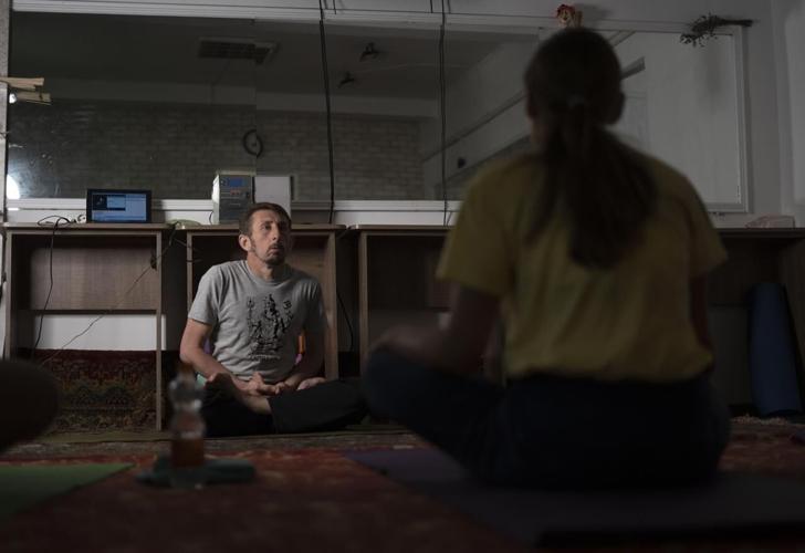 Yoga in a basement helps people in a Ukrainian front-line city cope ...
