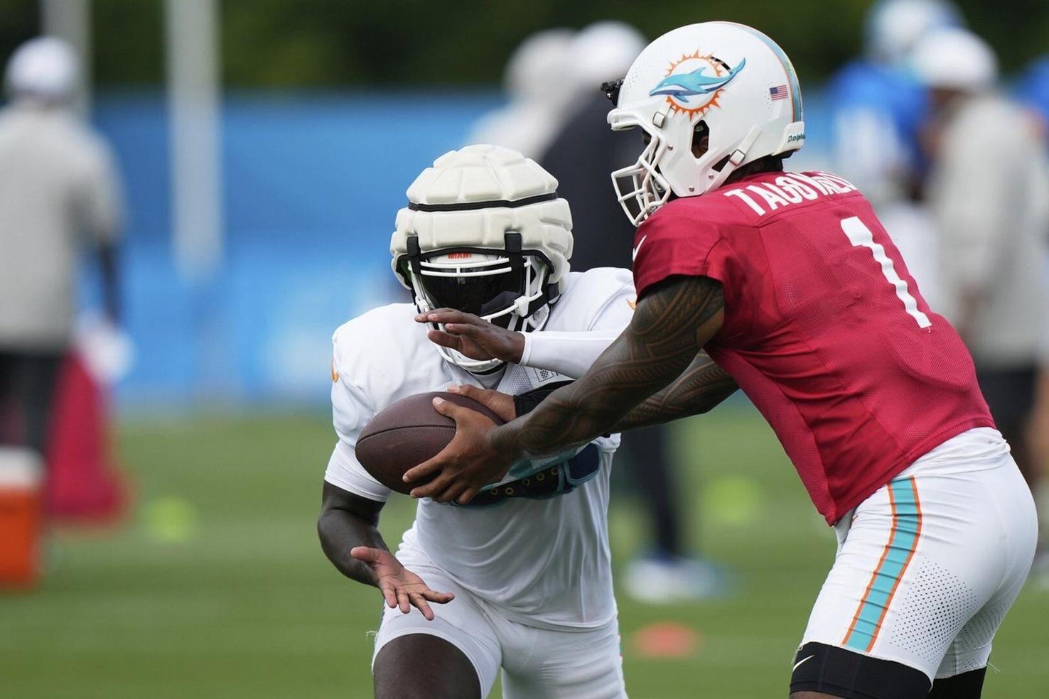 Dolphins' De'Von Achane likely will miss practice this week because of ...