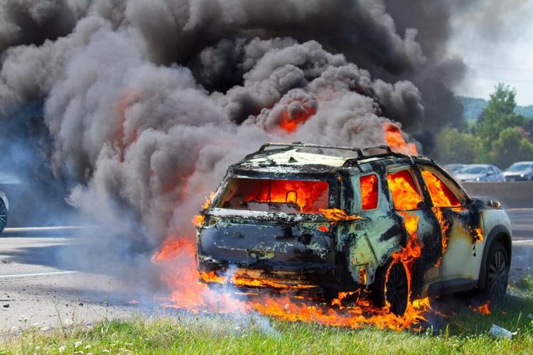Photos: SUV fire disrupts QEW traffic in Lincoln