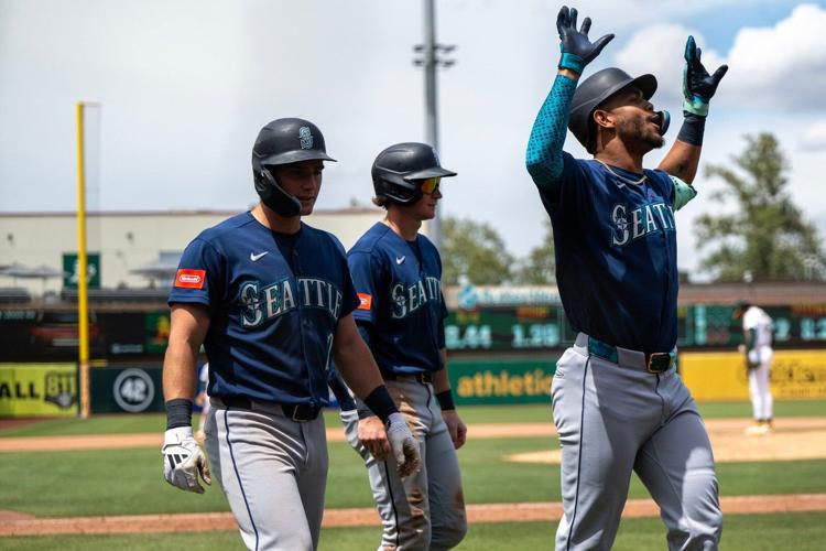Refsnyder, Rodríguez hit 3-run HRs as Mariners top Athletics 9-1, move ...