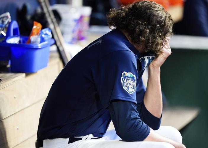 Rangers finally get to Gilbert, top Mariners 2-1 behind Gray