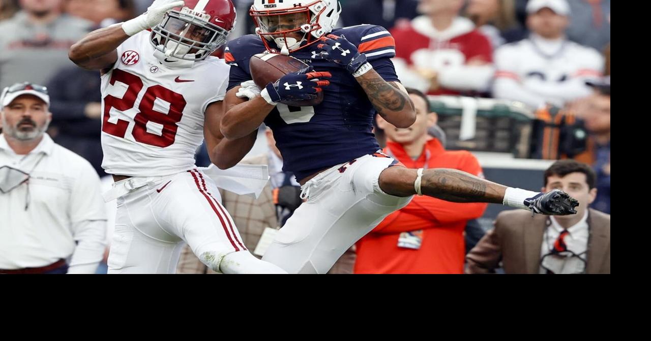 No. 3 Alabama rallies late, survives 4 OTs to beat Auburn