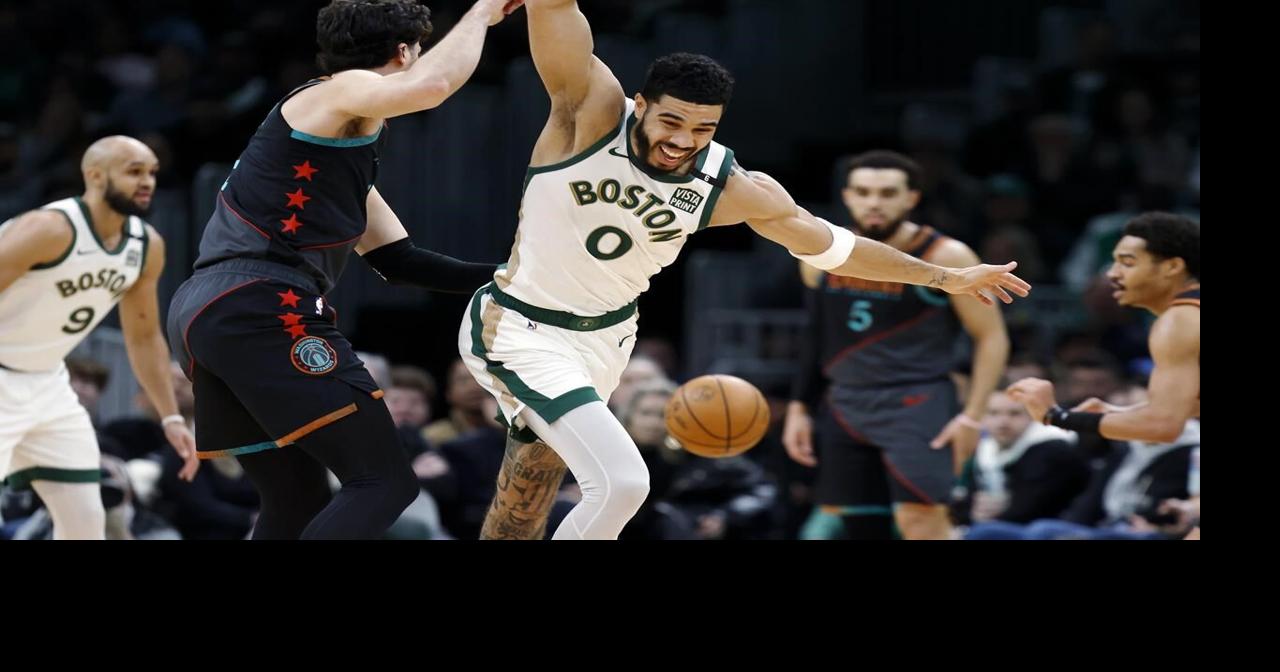 Tatum scores 35 points and Celtics ride 3rd-quarter rally to beat Wizards 133-129 for 40th win