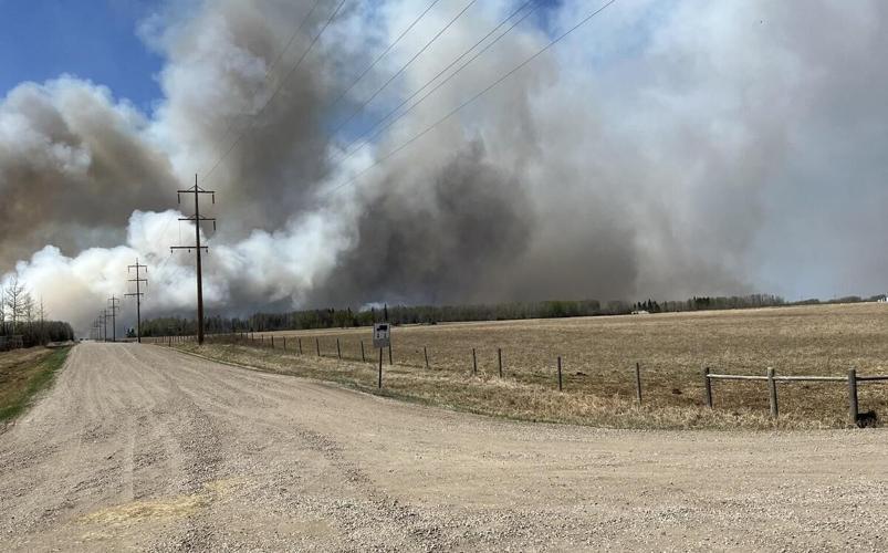 Alberta wildfires force 13,000 people to evacuate