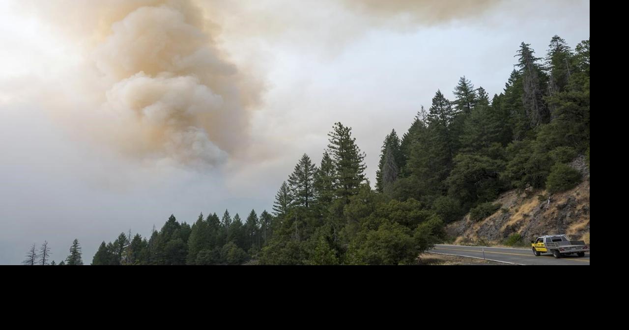Crews battle wildfires across the US West and fight to hold containment ...