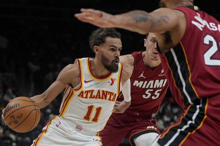 Hawks allow their fewest points in nearly 4 years, shut down Heat 98-86
