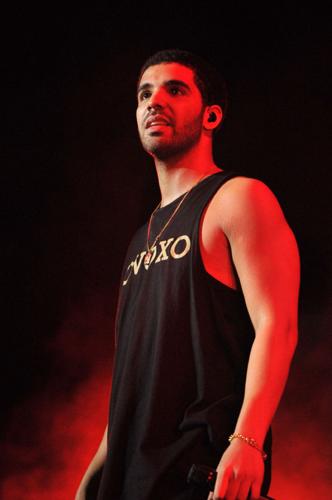 Drake wins award, gives cash to charity