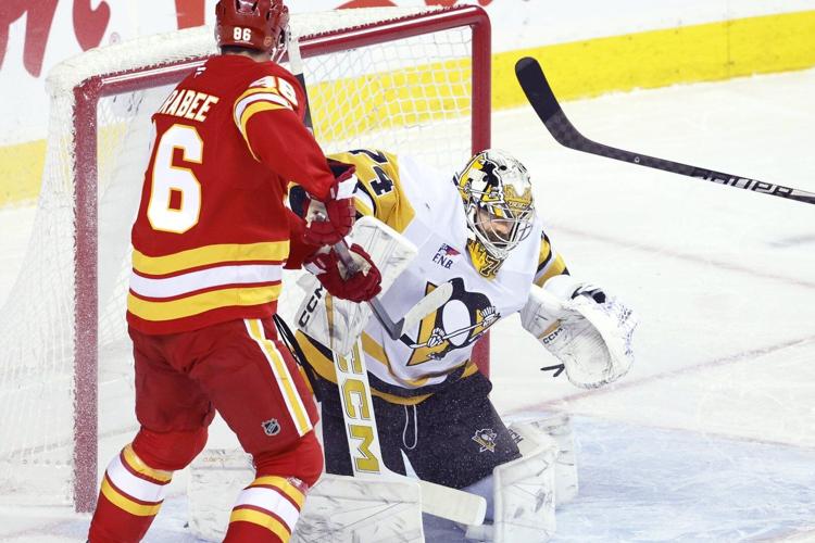 Malkin, Novak lead Pittsburgh Penguins past Calgary Flames 4-1