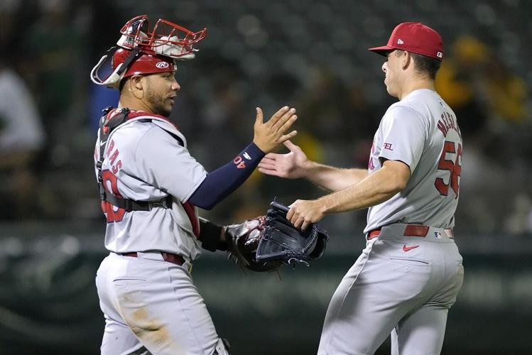 Lynn earns his first win in second stint with Cards, who beat A's ...