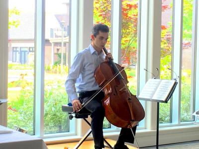 guy playing cello