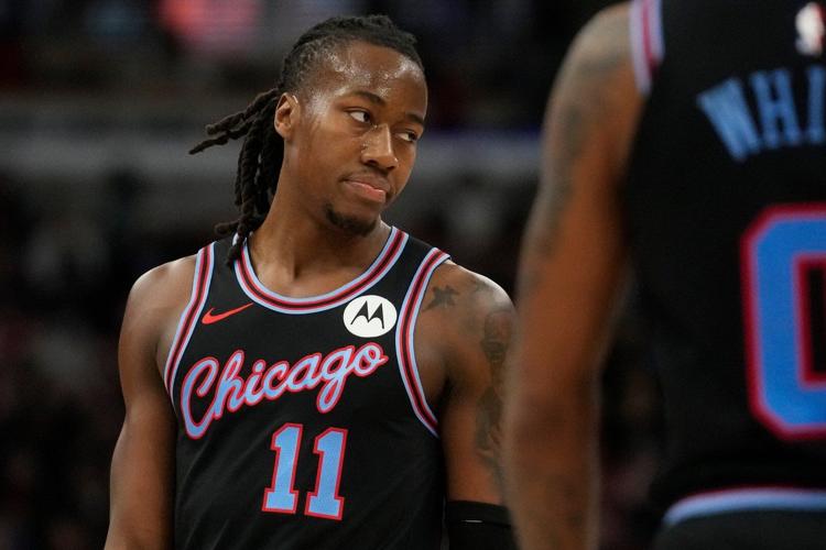 Powell scores 21 points and Heat outlast Bulls for 116-113 win