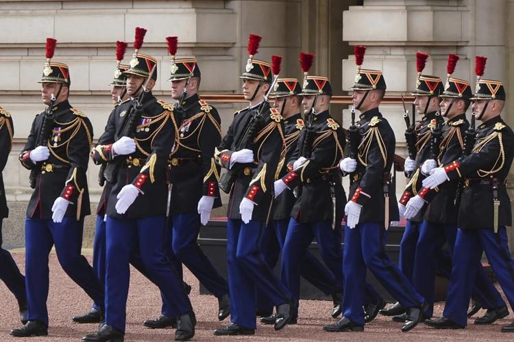 British, French troops march in historic joint parades in London and ...