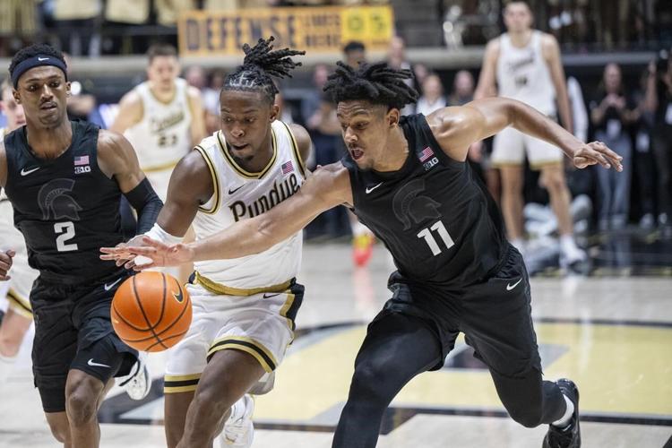 Edey leads No. 2 Purdue past Michigan State 80-74 to clinch share of 2nd straight Big Ten title