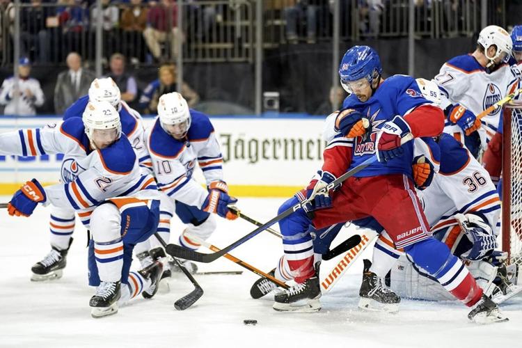 Oilers score 4 times in third period to defeat Rangers