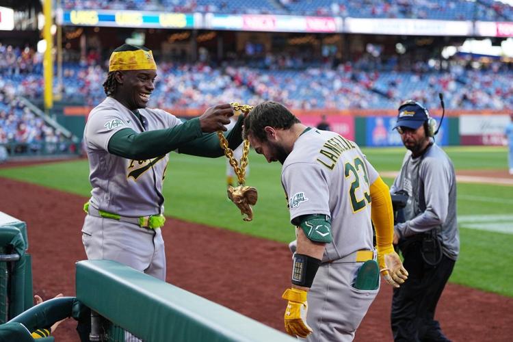 Ginn goes 8 innings and Gelof hits one of four A's homers in 12-1 rout ...