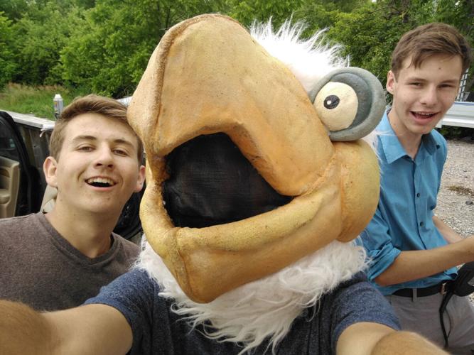 Grimsby graduates get top marks for car on roof prank