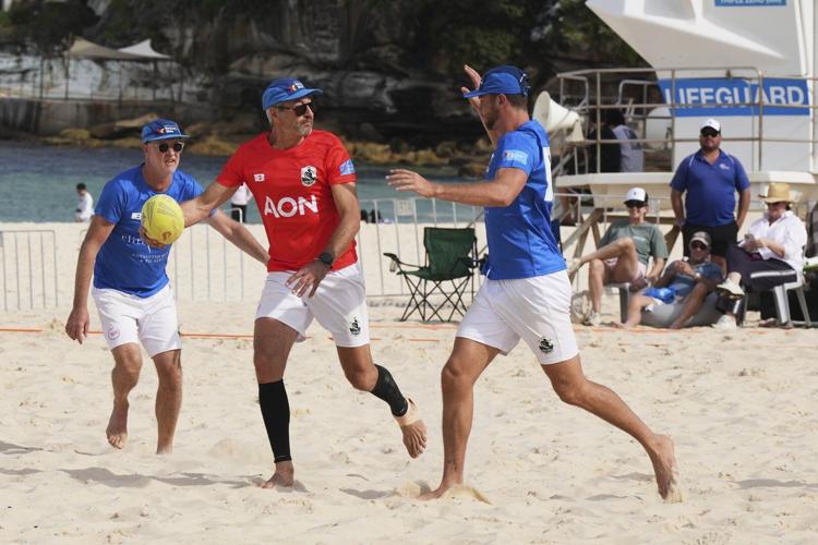 Australian friends claim world record for longest beach touch rugby game