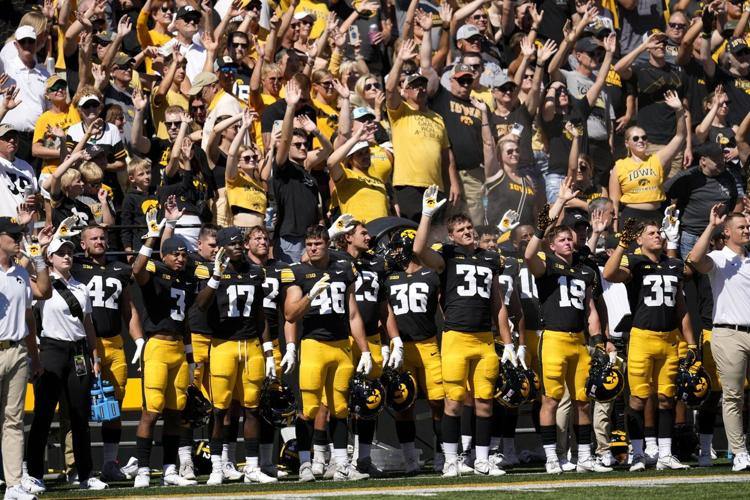College football traditions: 'Hawkeye Wave' bonds everyone in stadium ...