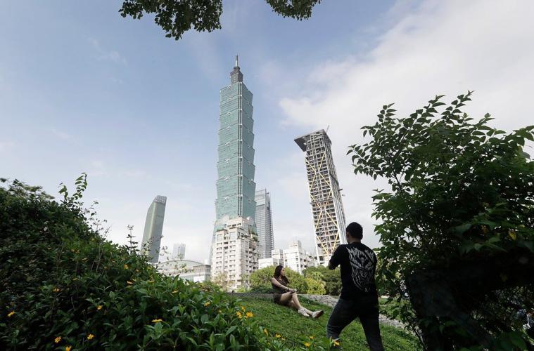 Alex Honnold is climbing Taipei 101 with no ropes, live on TV. It's ...