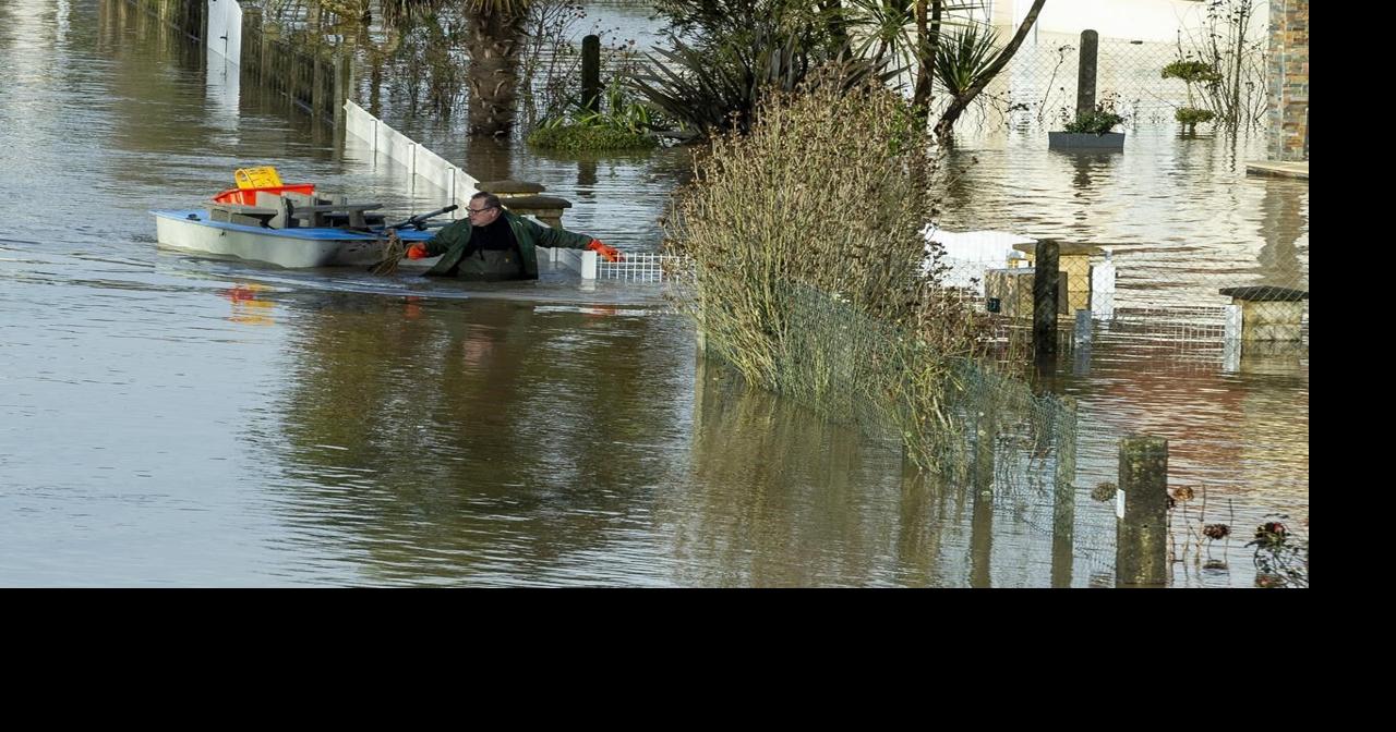 French residents rescued from flooded homes by boat as Storm Herminia ...