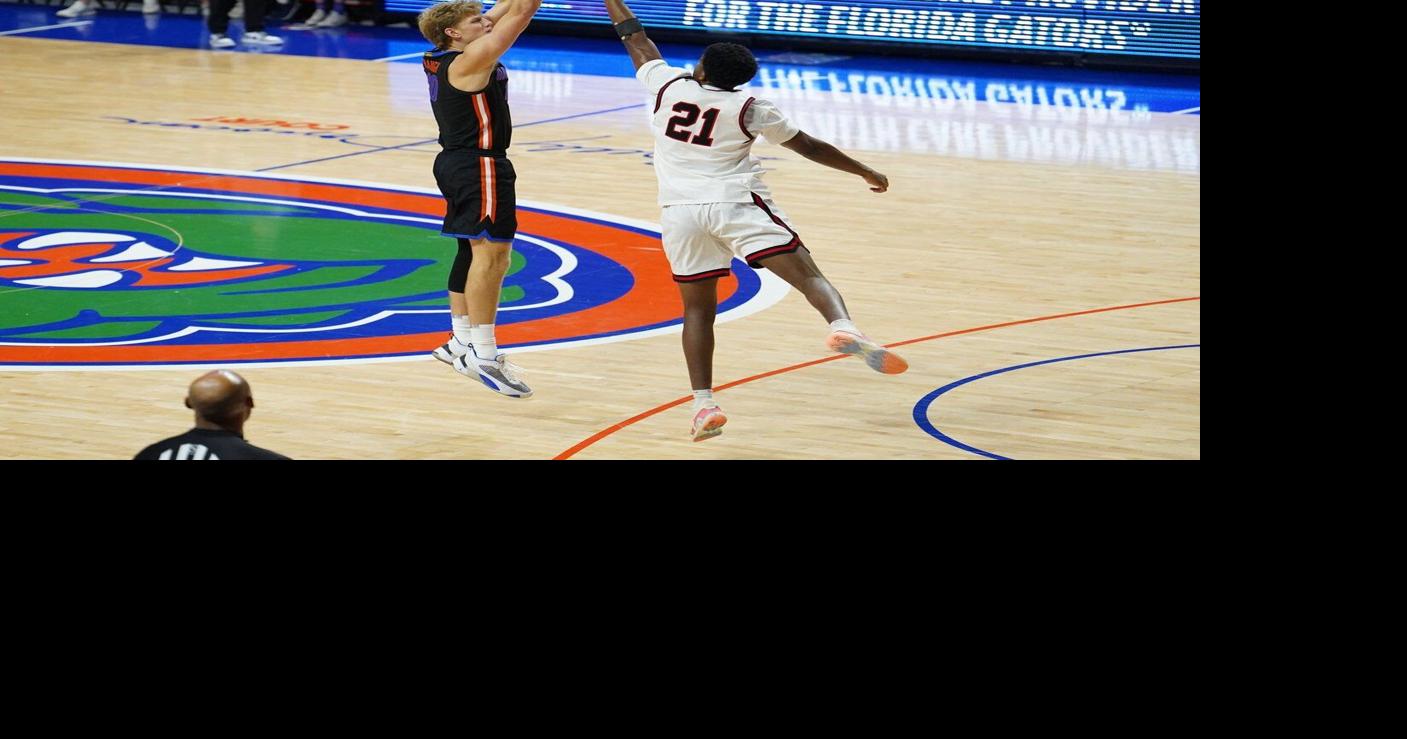 World's tallest teen dunks for first college field goal as No. 23 ...