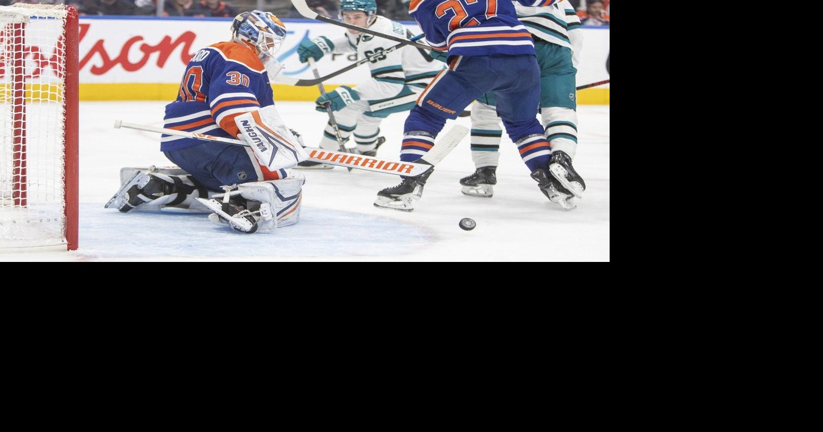 Oilers clinch playoff spot, but lose two key players in the process