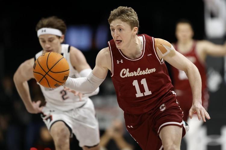 No. 18 Charleston wins 20 straight, beats Northeastern 87-61