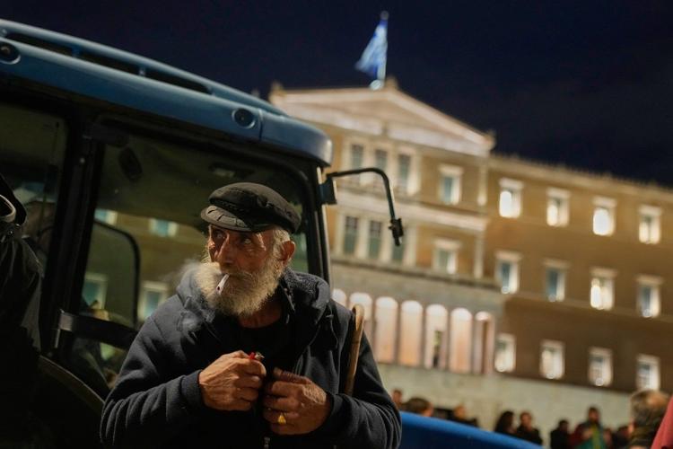 Angry Greek farmers converge on parliament with tractors in overnight ...