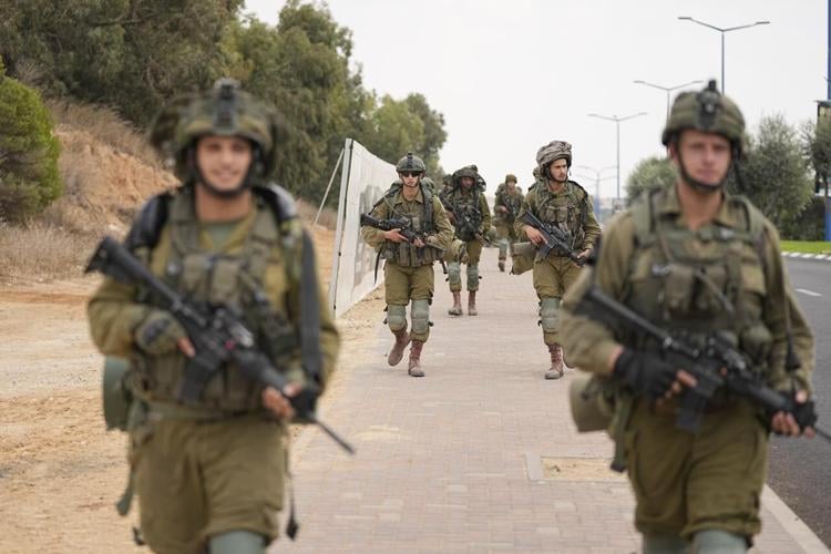 As strikes devastate Gaza, Israel forms unity government to oversee war ... As strikes devastate Gaza, Israel forms unity government to oversee war ...