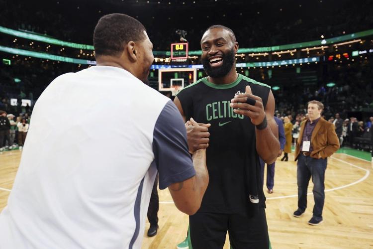 Marcus Smart gets in shouting match with a fan in his return to Boston ...