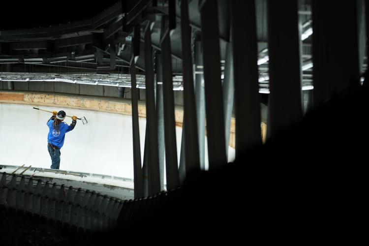 First skeleton test race on controversial new Olympic sliding track won ...