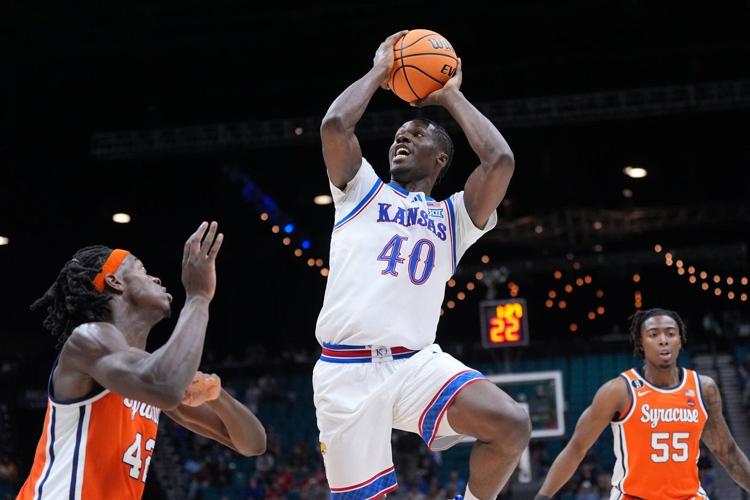 Double-doubles by Tre White and Flory Bidunga help Kansas beat Syracuse ...