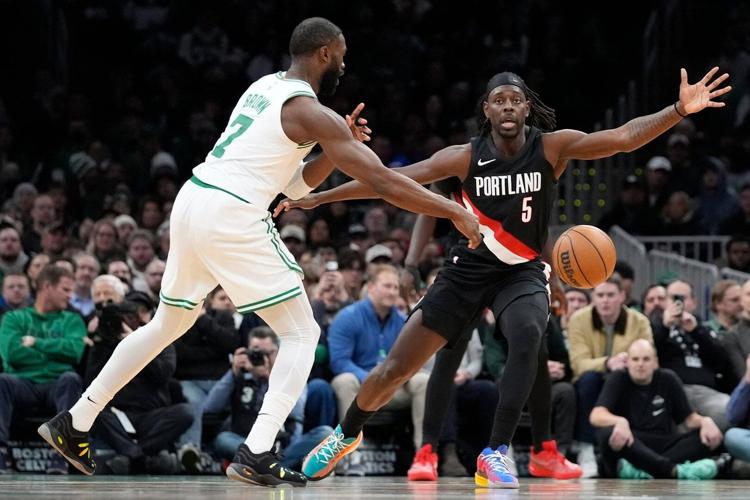Blazers guard Jrue Holiday gets champion's welcome in return to Boston ...