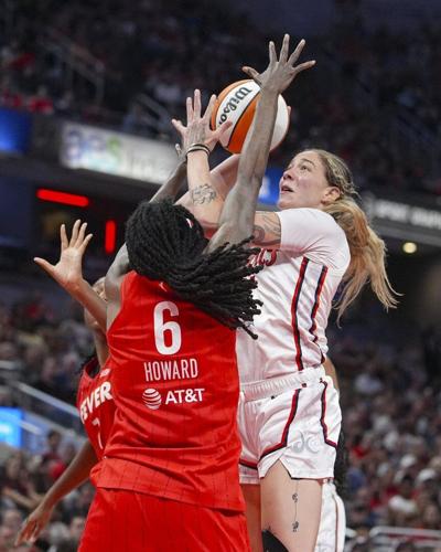 Natasha Howard scores 17 as Fever beat Mystics 84-65, clinch playoff spot