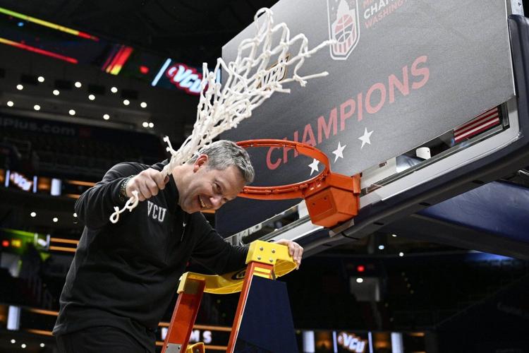 Virginia hires VCU coach Ryan Odom, whose father was a Cavaliers assistant