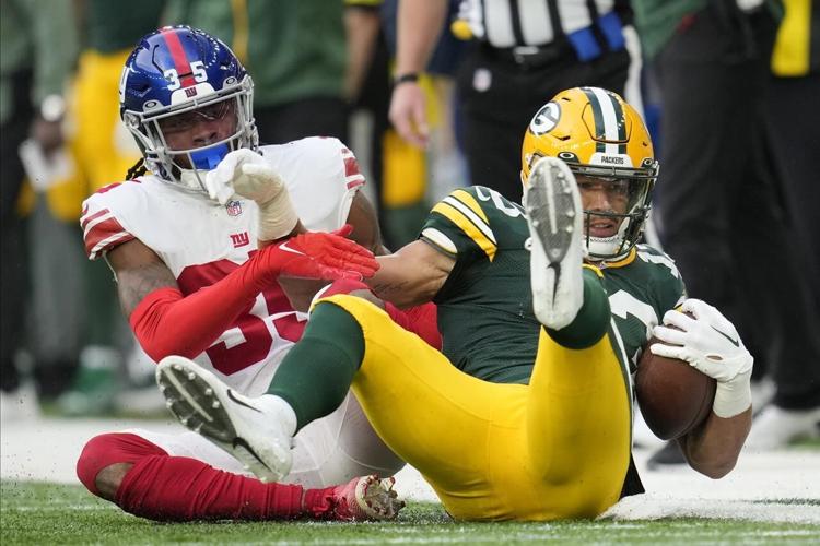 Packers stagger back home after surprising loss to Giants
