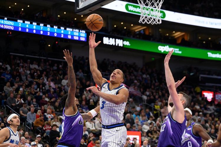 Desmond Bane scores 32 points, including winning layup, to lead Magic ...