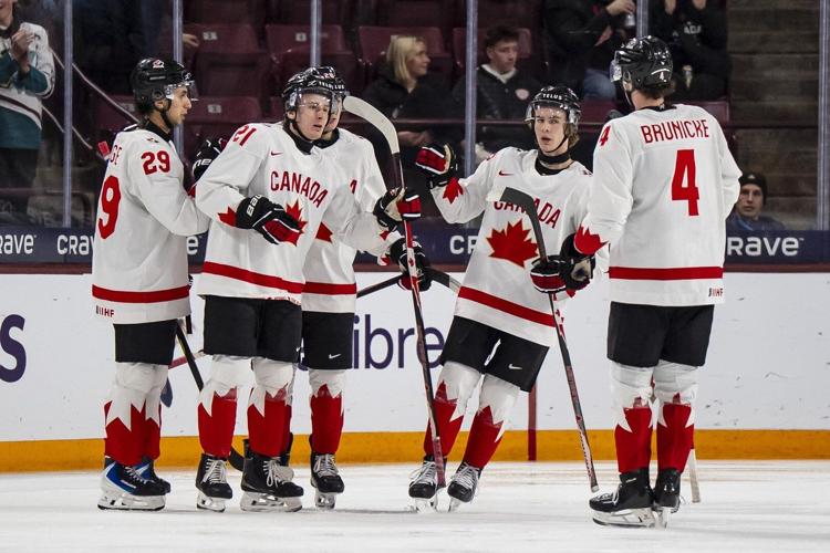 Hage scores in OT, Canada squeaks by Latvia 2-1 at world junior hockey ...