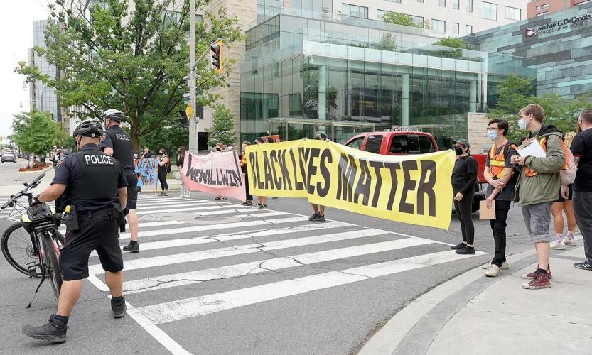 ‘Defund the police’ painted outside Hamilton city hall as activists ...