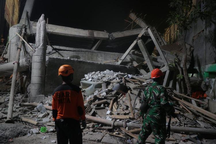 Photos from the collapse of an Islamic school building in Indonesia
