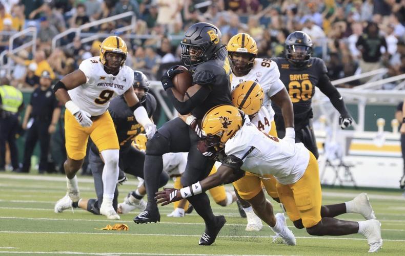 Defending Big 12 champion Arizona State wins league opener 27-24 at ...
