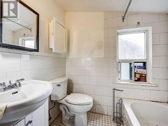 Why this Toronto triplex sold for under $1 million