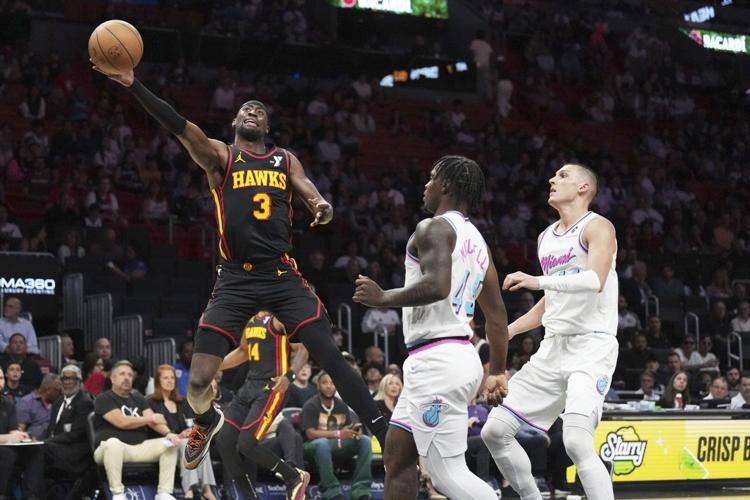 Herro scores 36, Heat shake off slow start to beat Hawks 122-112 for ...