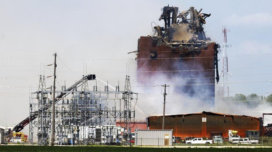 An explosion and fire at a Nebraska plant are preventing a search for 3 missing people
