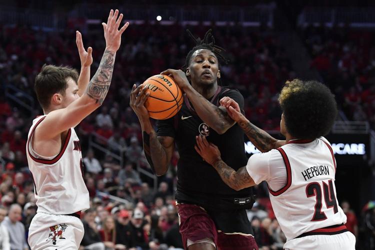 Hepburn’s 29 points, including 5 late free throws, help No. 25 Louisville beat Florida State 89-81