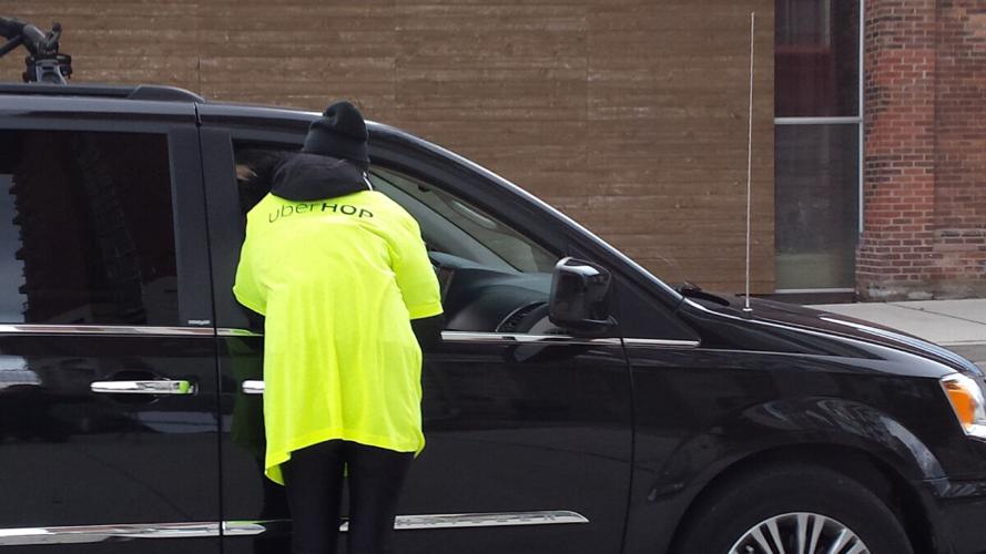 Downtown commuters test the waters on UberHop