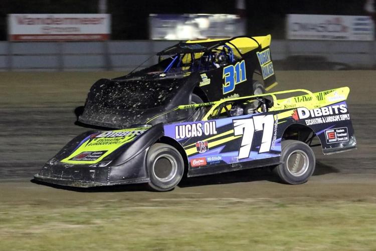 Dirt-track racer doesn’t mind getting her hands dirty