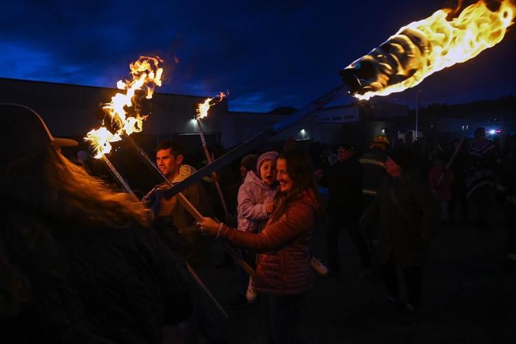 'Burn, beetle, burn': Hundreds of people torch an effigy of destructive ...