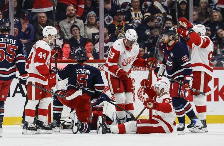 Red Wings score four times in third period to ground Jets 5-1